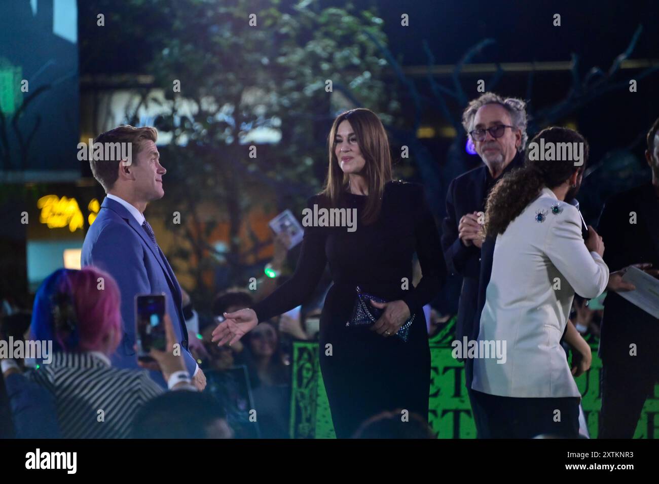 (L-R) Tommy Harper, Monica Bellucci, and Tim Burton are attending the ...