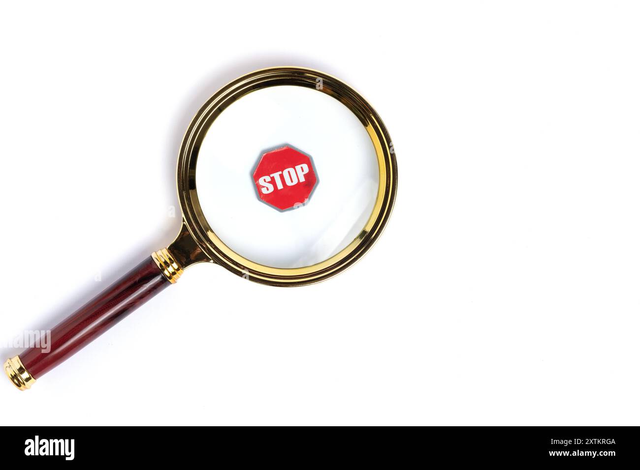 Stop sign magnifying glass hi-res stock photography and images - Alamy