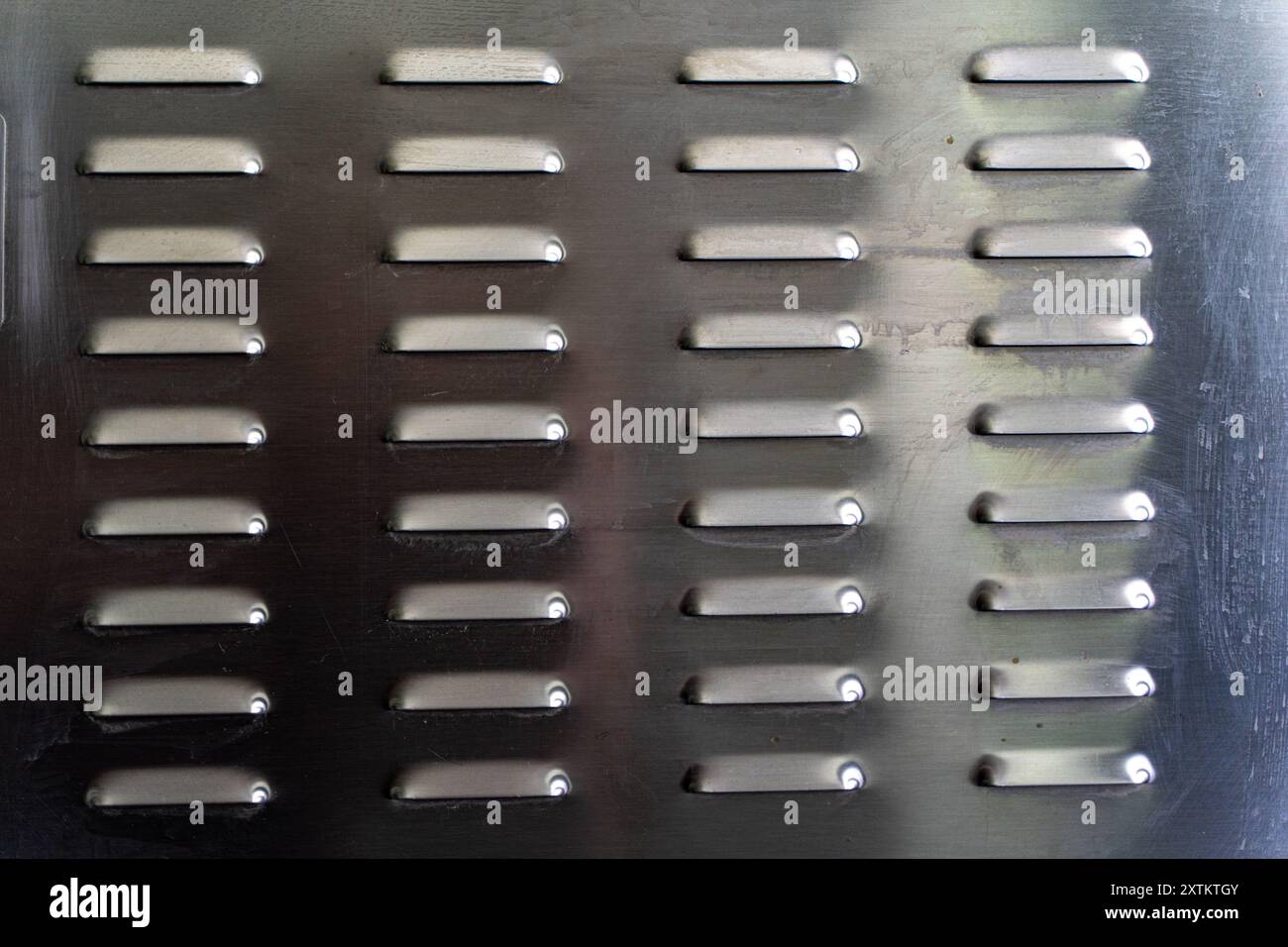 Metal industrial background, back wall of a refrigerator or combi oven ...