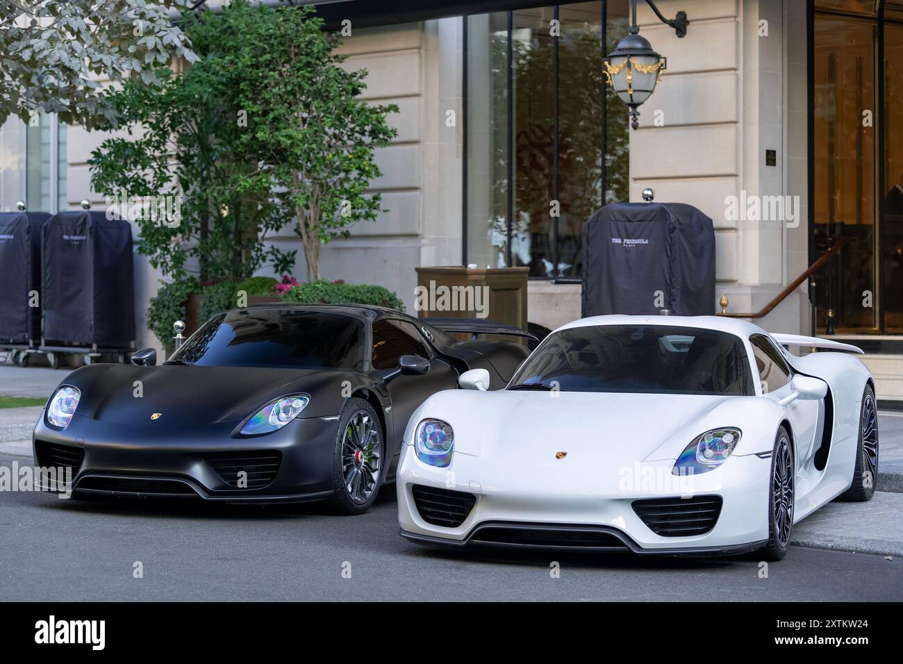 Paris, France - View on two Porsche 918 Spyder parked on a Parisian ...