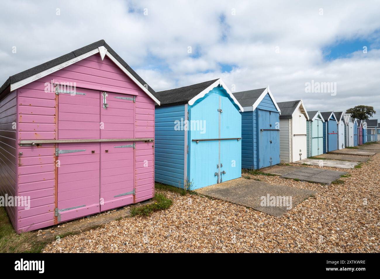 Colourful beach huts at Calshot, Hampshire, England, UK. Seaside view ...