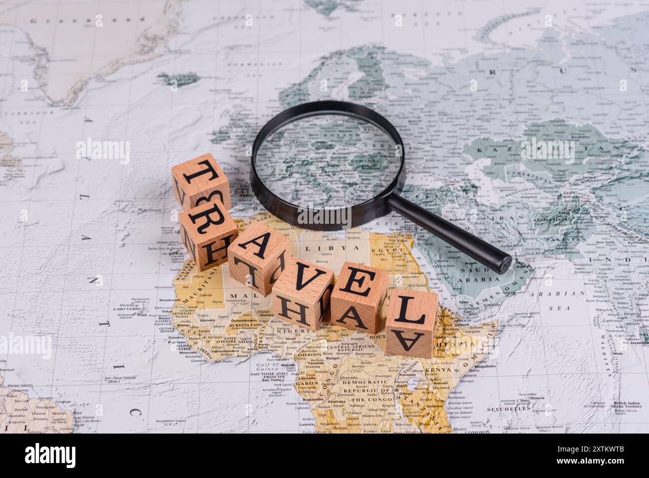 Conceptual background for travel with passport, magnifying glass, world ...