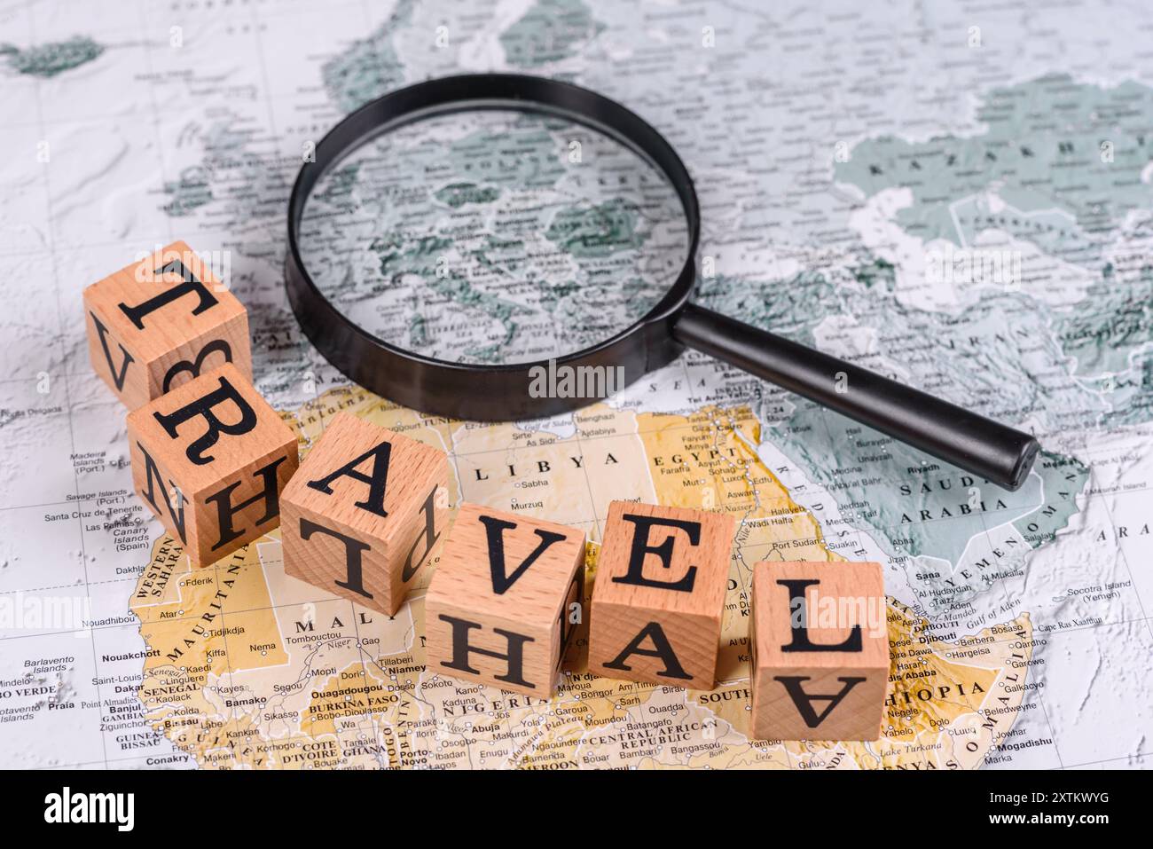 Conceptual background for travel with passport, magnifying glass, world ...