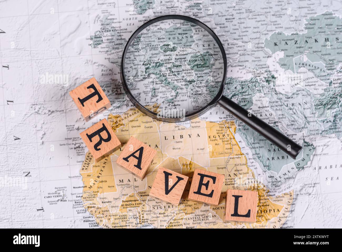 Conceptual background for travel with passport, magnifying glass, world ...