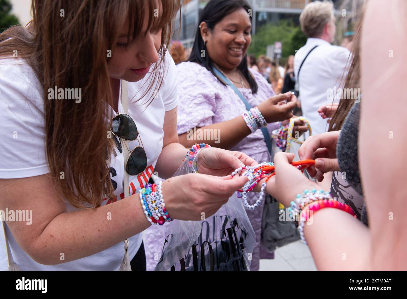 London, 15th August 2024, Swifties trading bracelets ahead of Taylor ...