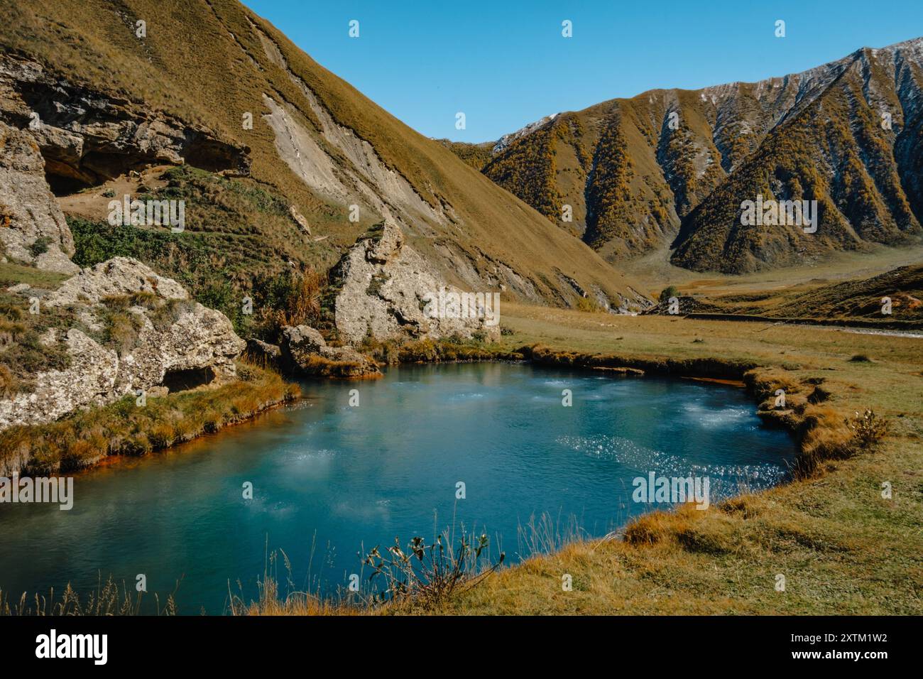 The blue, bubbling waters of Lake Abano, in the Truso Gorge in the ...