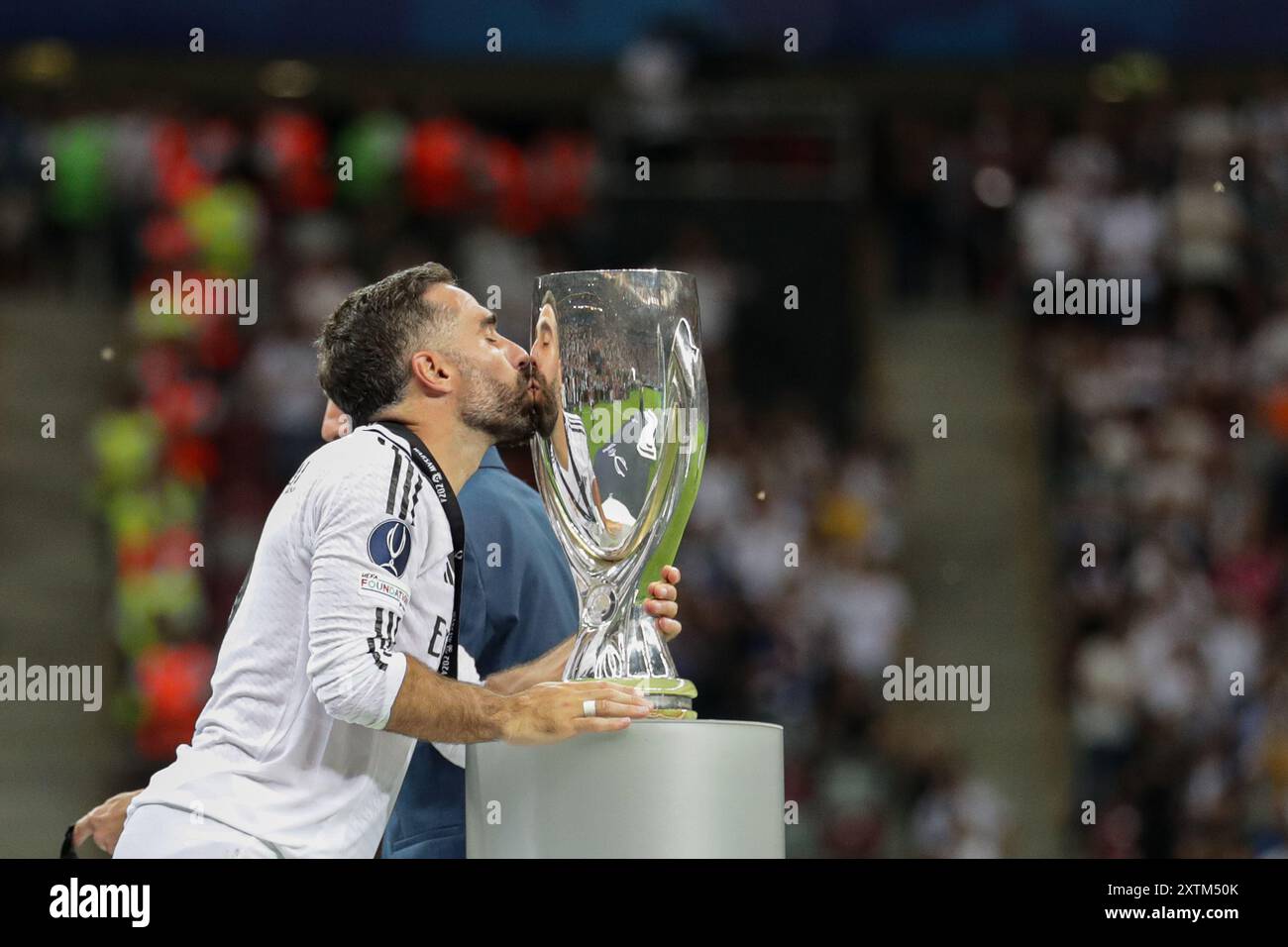 Daniel Carvajal of Real Madrid kisses the trophy during the ceremony ...