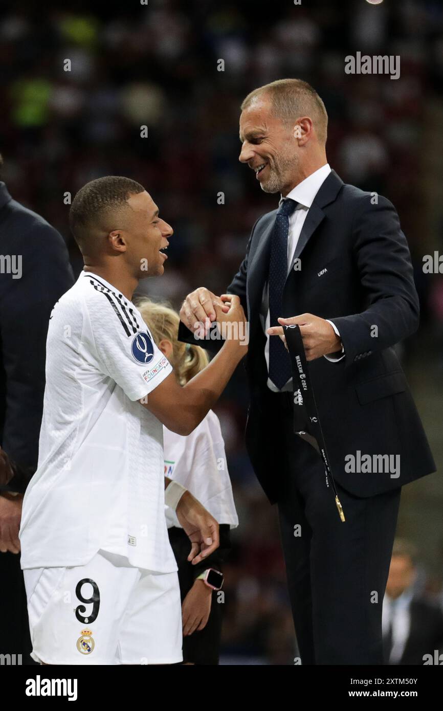 Kylian Mbappe of Real Madrid (L) and Aleksander Ceferin (R) seen during the ceremony after the ...