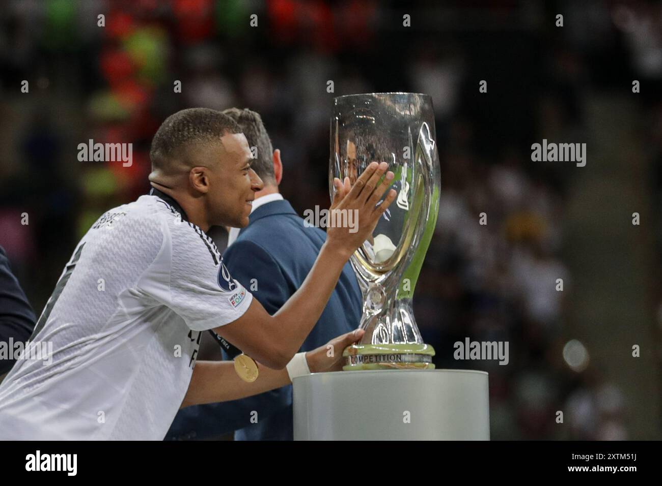 Kylian Mbappe of Real Madrid touches the trophy during the ceremony after the UEFA Super Cup ...