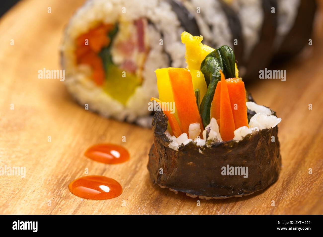 A close up of the end piece of a Korean treat called Kimbap. Food made ...