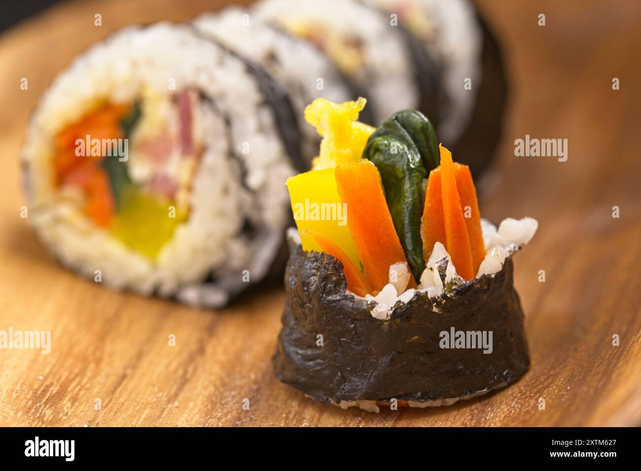 A close up of the end piece of a Korean treat called Kimbap. Food made ...