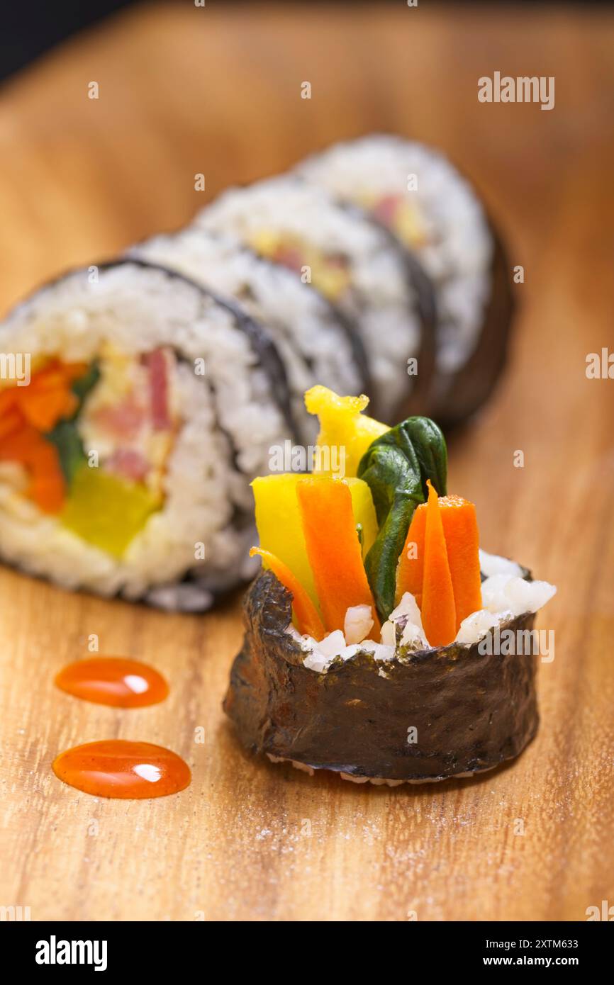 A close up of the end piece of a Korean treat called Kimbap. Food made ...