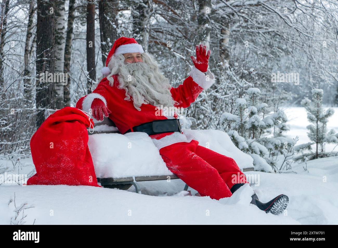 Santa claus sitting on a bench hi-res stock photography and images - Alamy