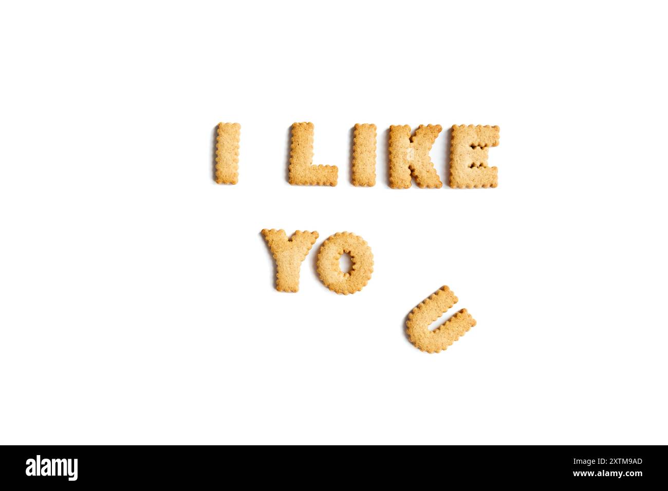 The phrase I like you, made up of cookie letters on a white background ...