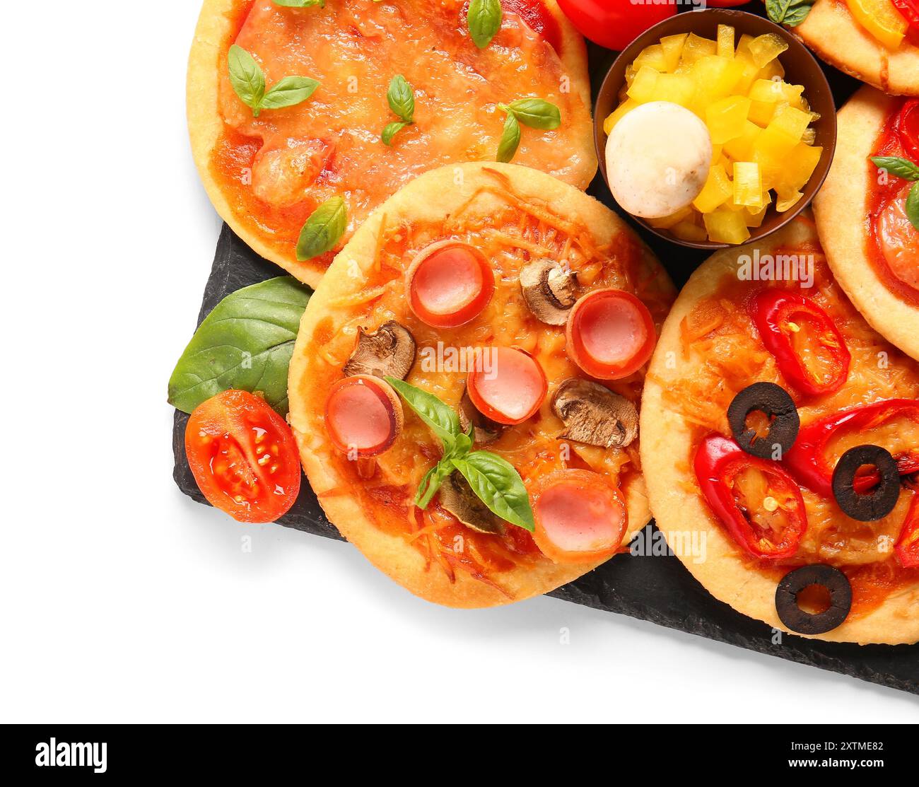 Board with different tasty mini pizzas on white background Stock Photo ...