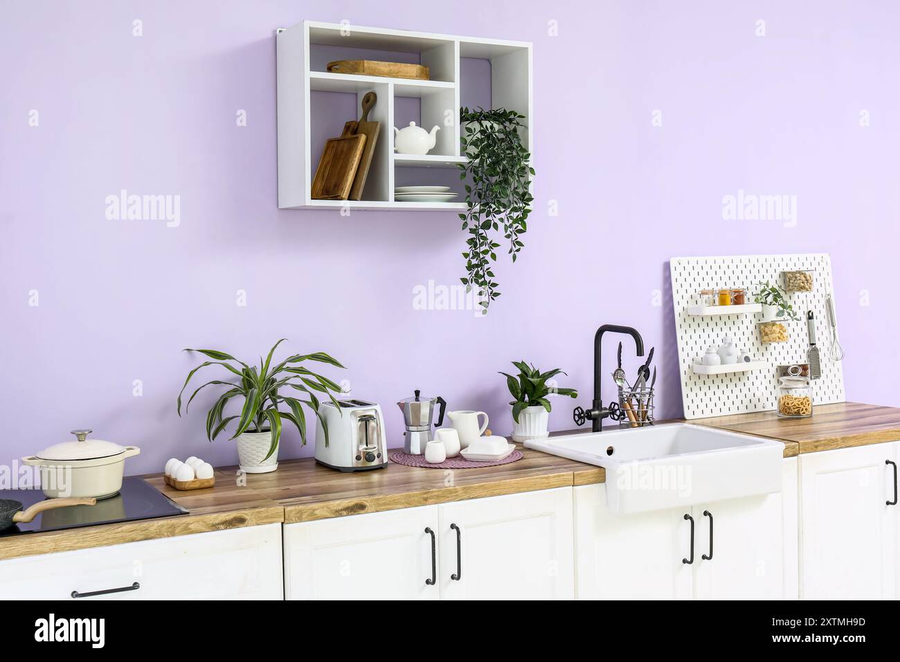 Interior of modern kitchen with sink and toaster Stock Photo - Alamy