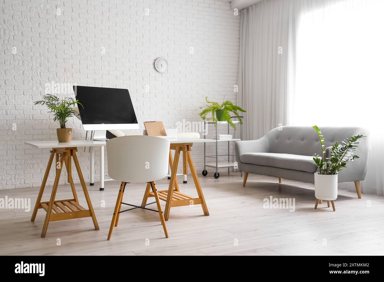 Interior of medical office with doctor's workplace and sofa Stock Photo ...
