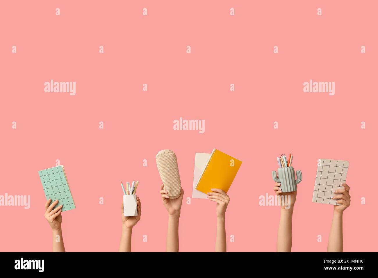 Female hands with different school supplies on pink background Stock ...