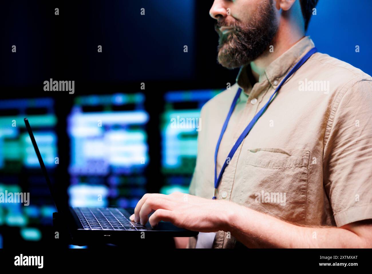 Employee reconfiguring server racks to optimize them for data processing requirements of ...