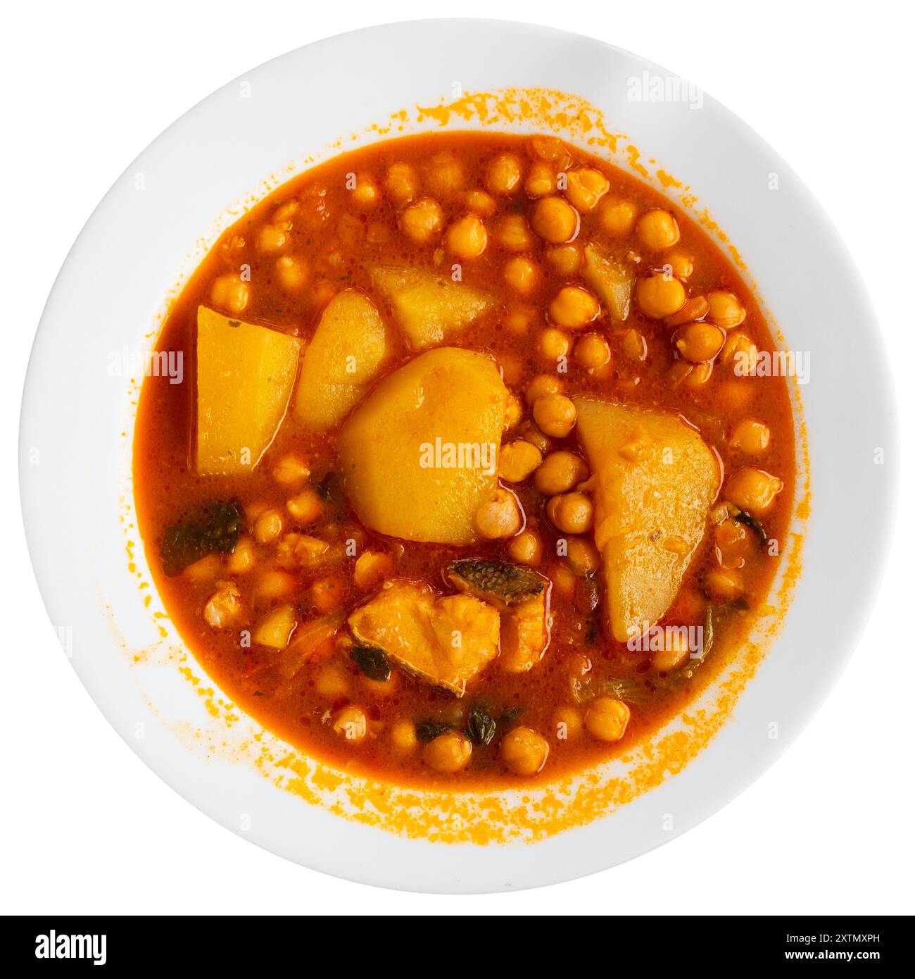 Chickpea stew served with cod fish Stock Photo - Alamy