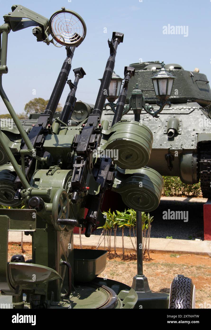 A Czechoslavakian 12.7mm Calibre Anti-Aircraft Gun and Russian SAU-100 ...