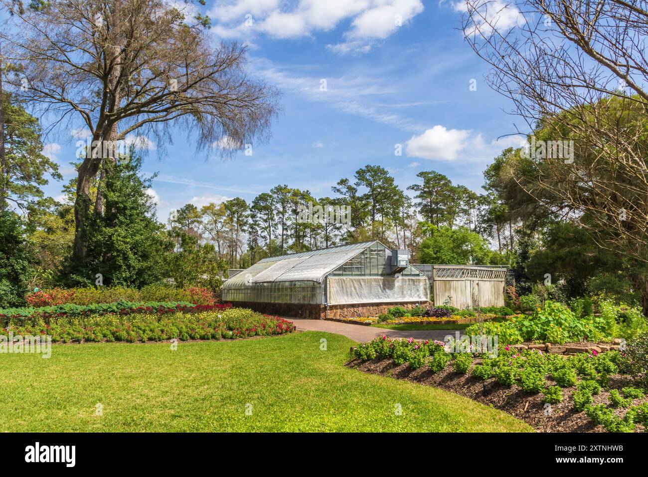 Greenhouse and garden paths at Mercer Arboretum and Botanical Gardens ...
