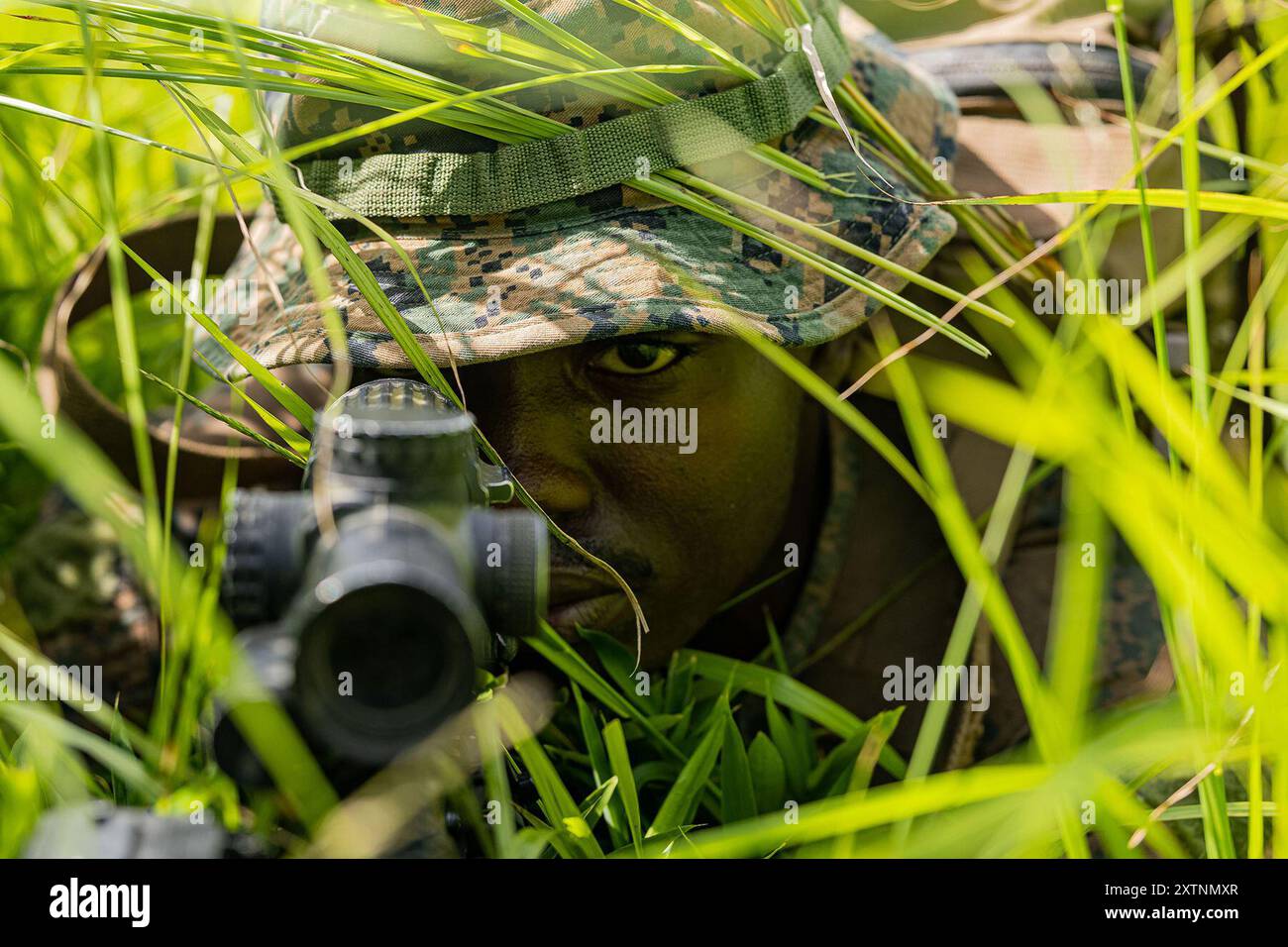 Japan. 1st Aug, 2024. Marine Corps Lance Cpl. Readchee Demesier aims an ...
