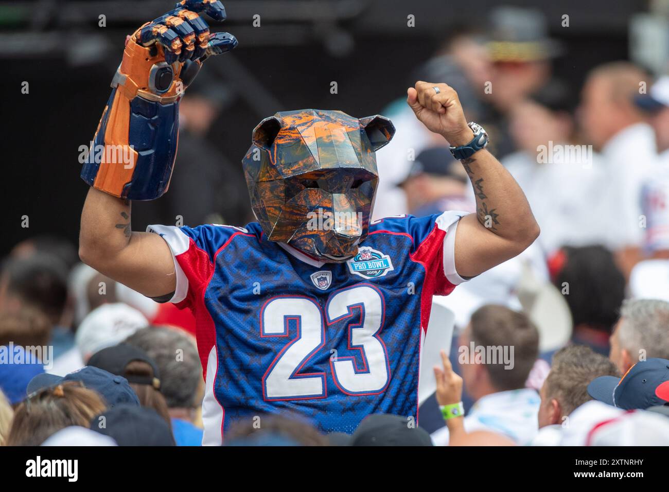 Chicago Bears fan in a mask celebrates player inductions during the Pro ...