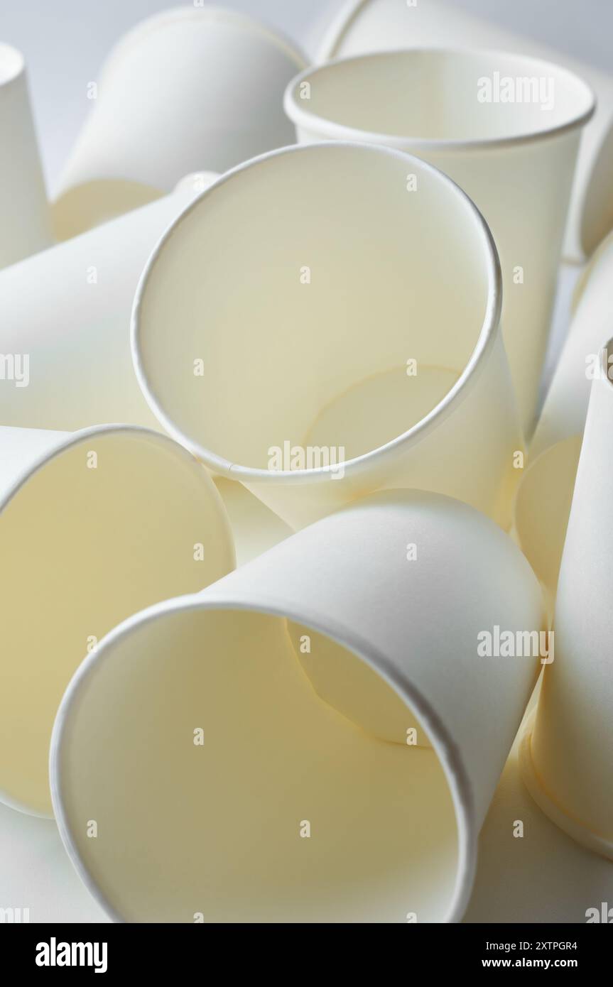 pile of disposable empty paper cups in full frame background, made from ...