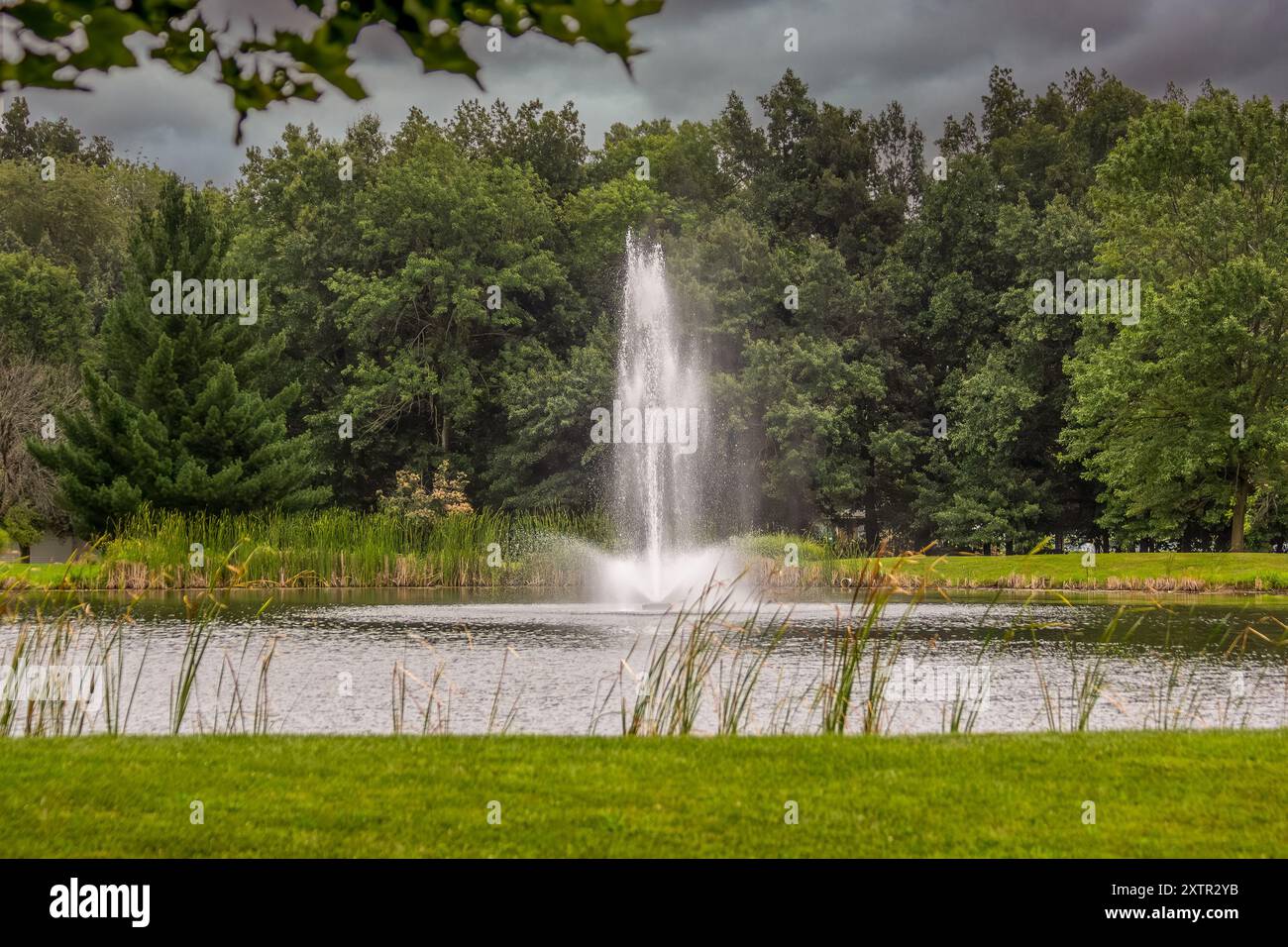 water fountain at city park on golf course Stock Photo - Alamy
