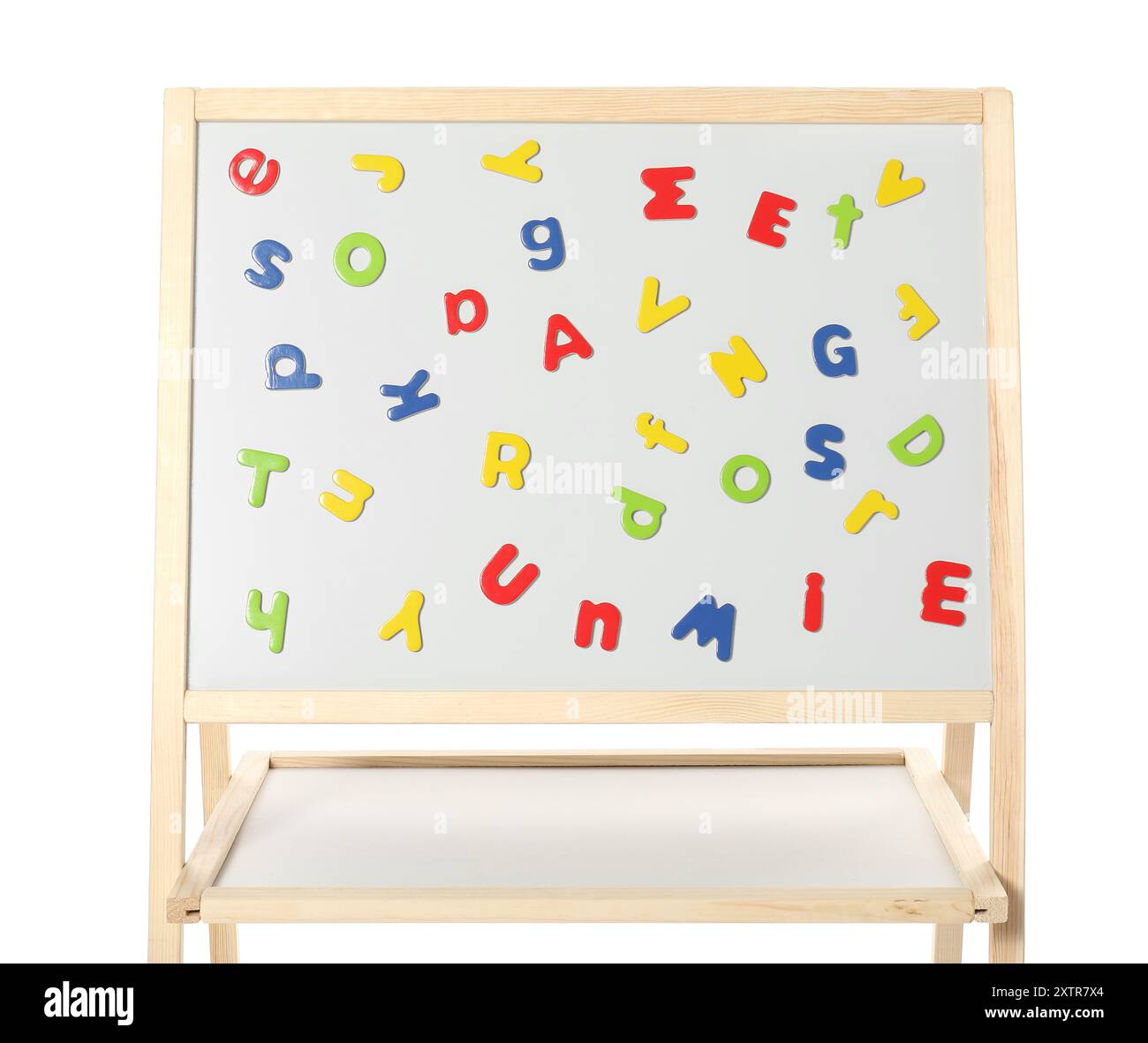 Learning alphabet. Magnetic letters on board against white background ...