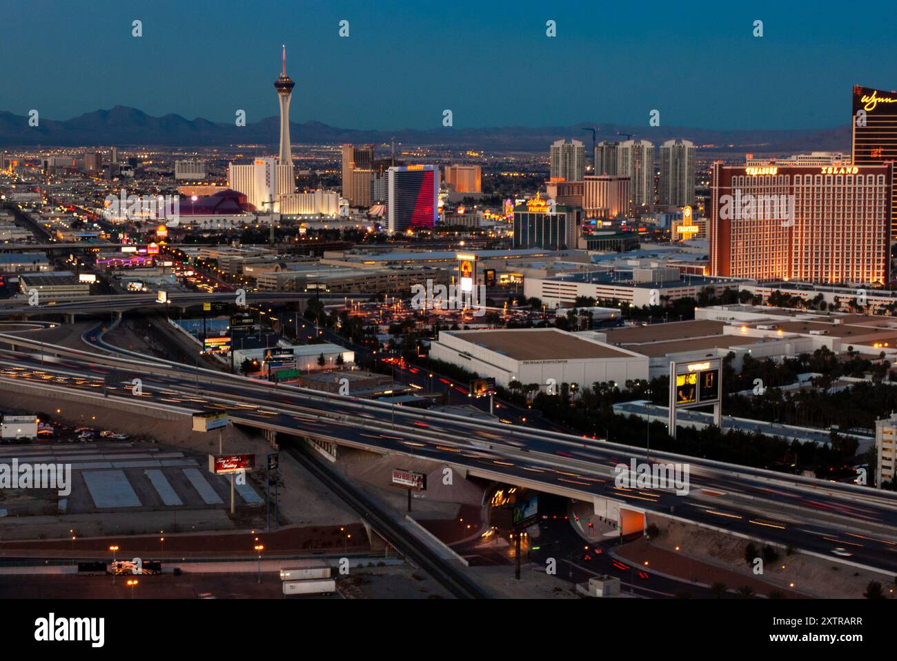 Lights go up on the casino hotels along the Las Vegas Strip, including ...