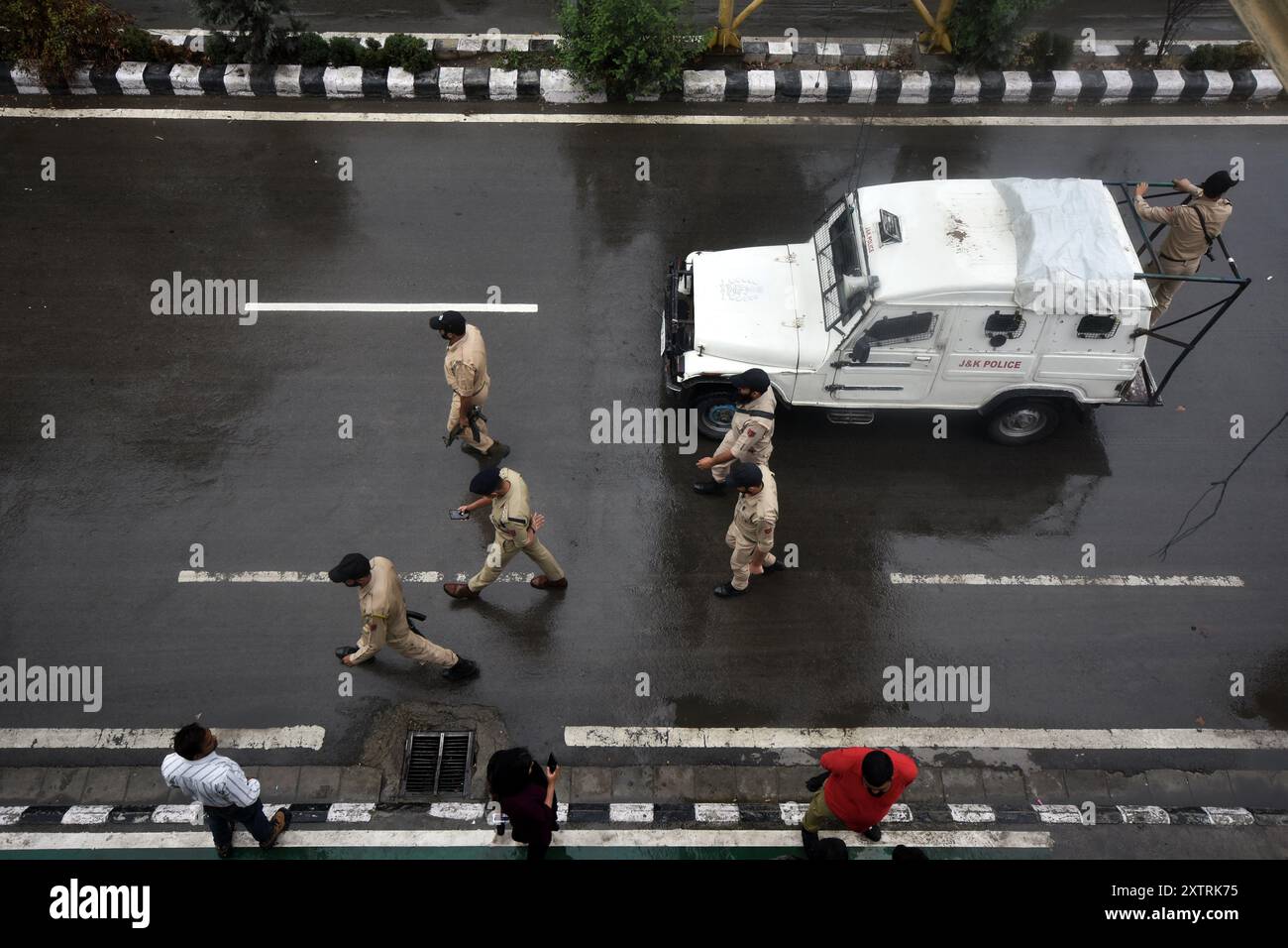 Indian policemen keeps vigil and patroling on road during India's 78th ...