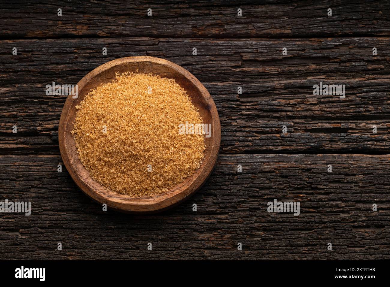 Organic cane panela powder in the bowl - Saccharum officinarum Stock ...