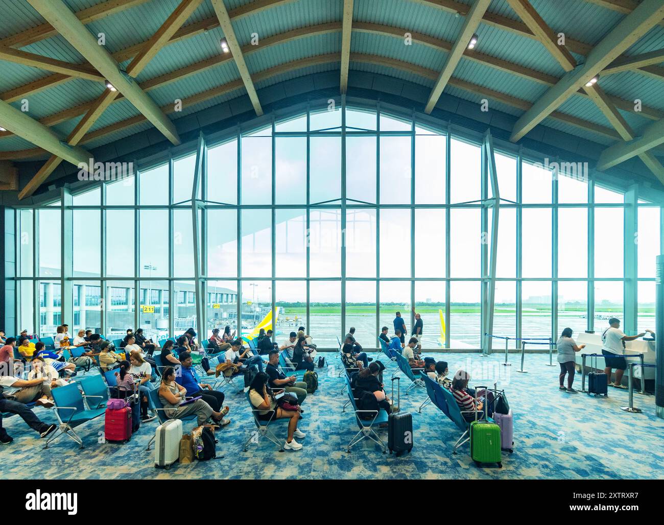 Passengers at the departure area of Clark International Airport in ...