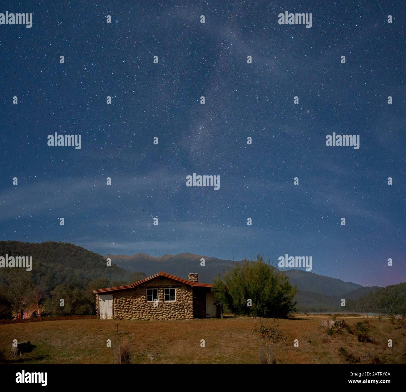 Spectacular nightscape image with the rising milkyway and moonlit high ...