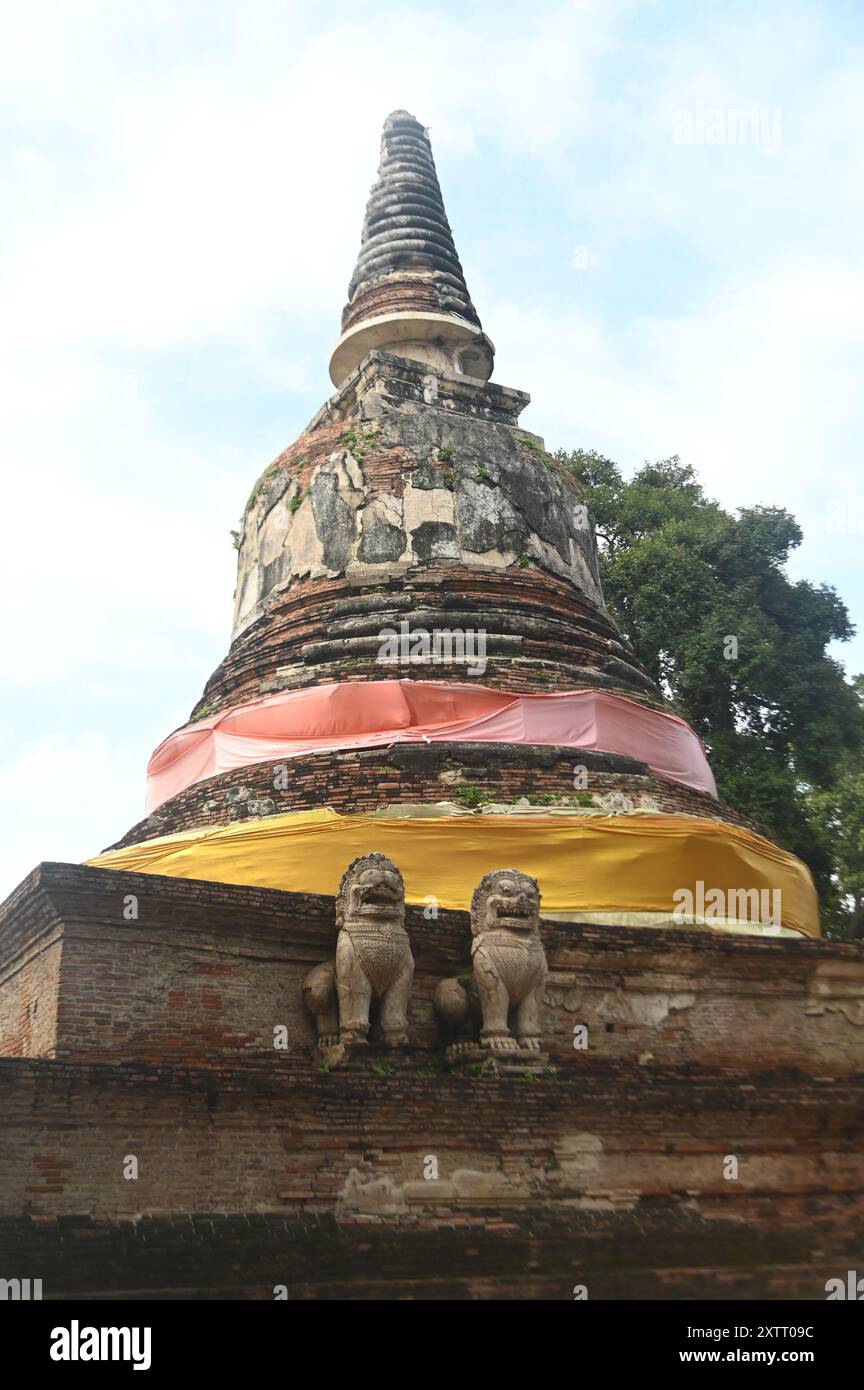 The main chedi of Wat Mae Nang Pluem. It is a large Lanka-shaped pagoda ...