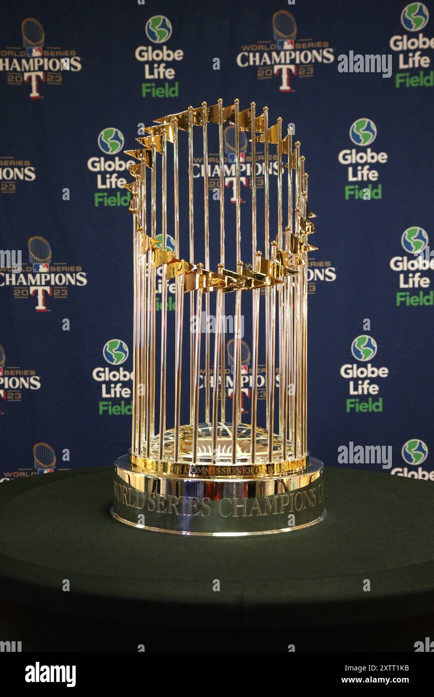 DALLAS, TX, USA - AUGUST 15, 2024. Attendees pose with the MLB ...