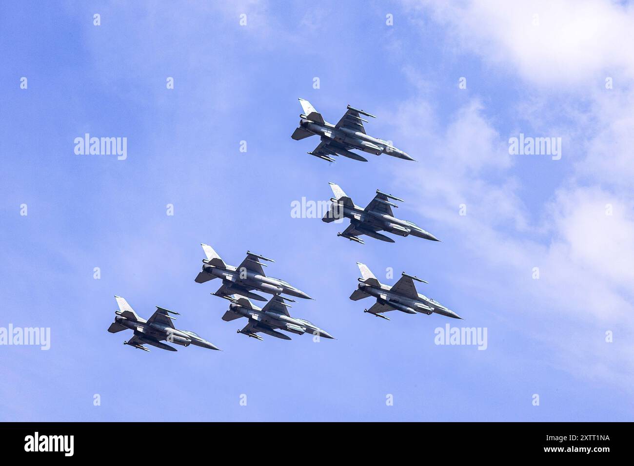 Polish F-16 jet fighters fly over the parade. Poland celebrates its ...
