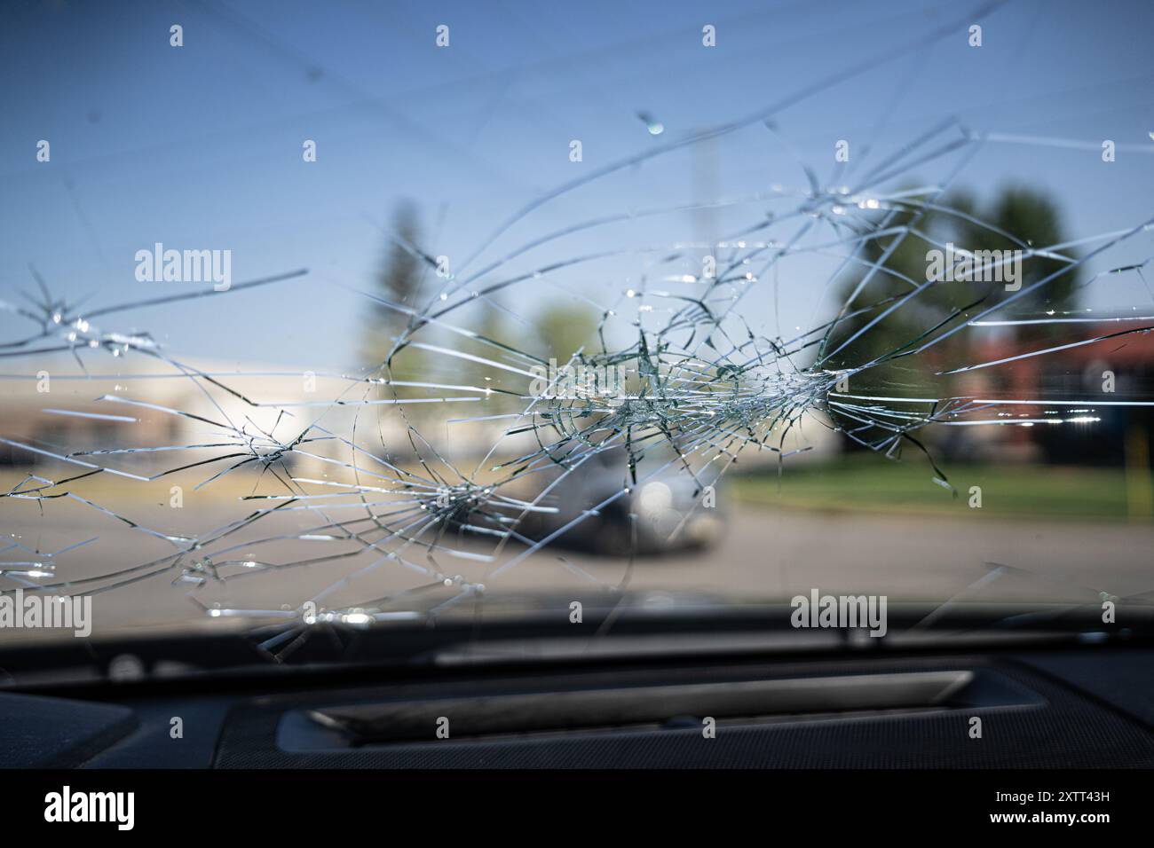 Smashed vehicle windscreen with massive hailstorm damage Stock Photo ...
