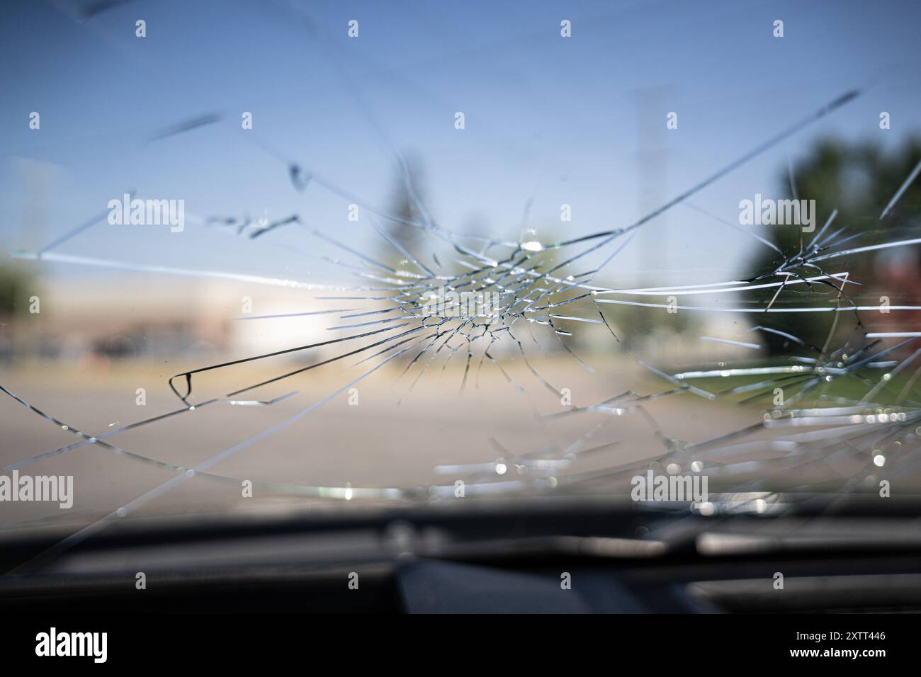 Smashed vehicle windscreen with massive hailstorm damage Stock Photo ...