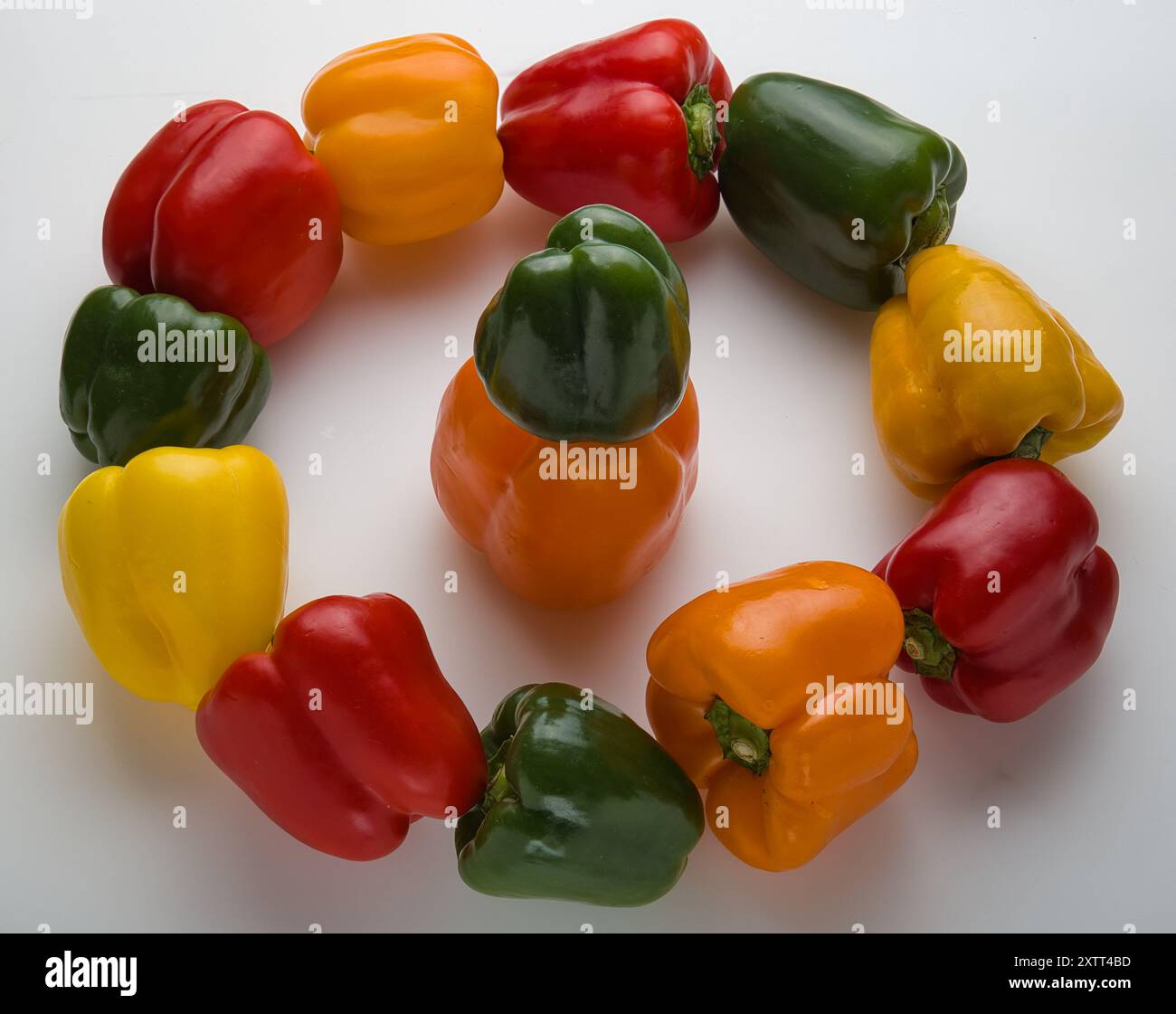 Group of dancing peppers in a circle Stock Photo - Alamy