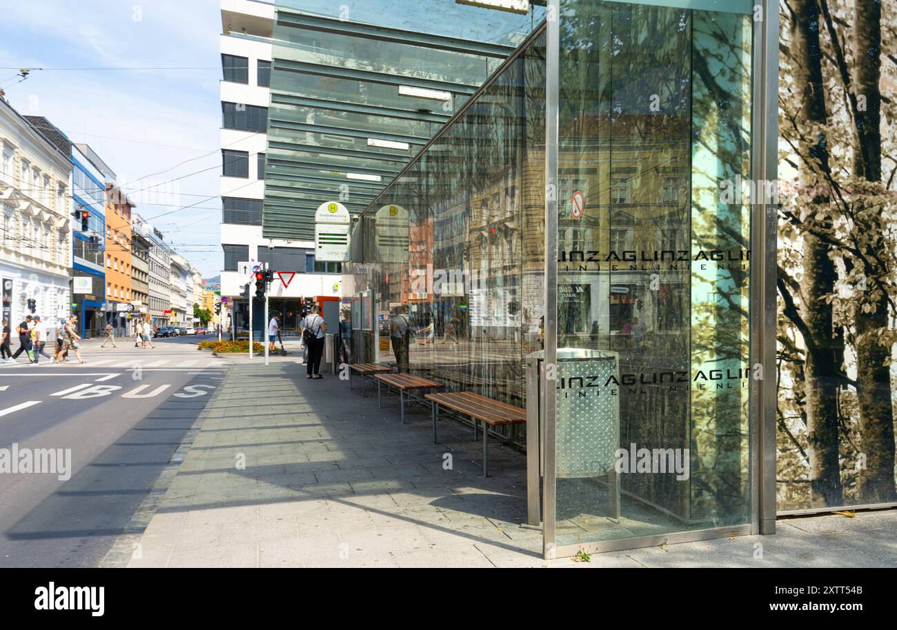 Linz, Austria. August 12, 2024. the bus stop in a street in the city ...