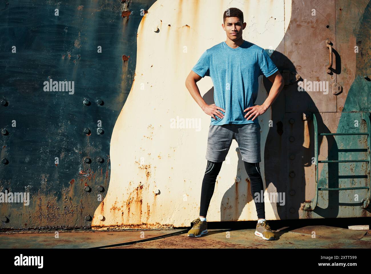 Fitness, portrait and wall background with sports man on space in city ...