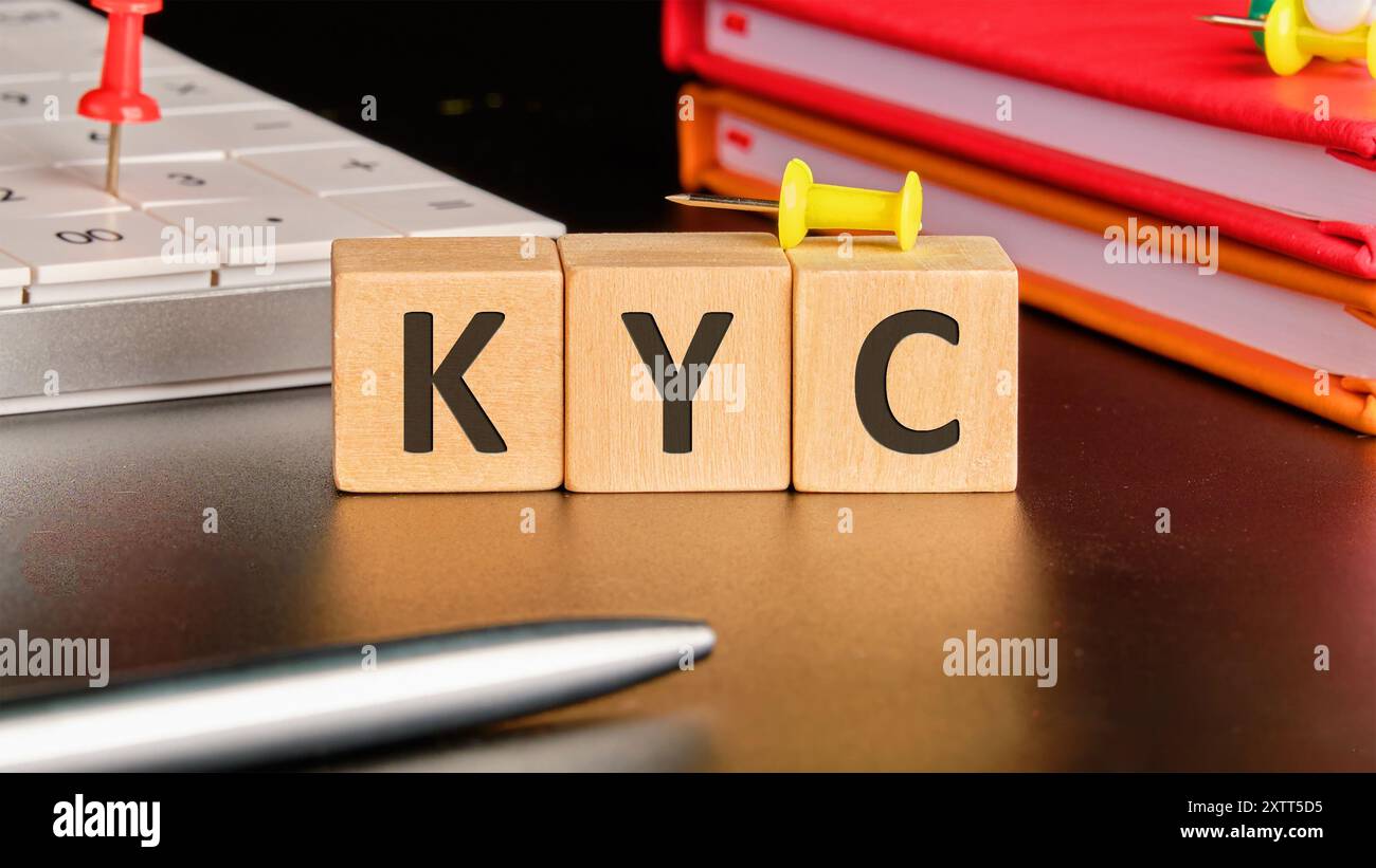 Business Acronym KYC Know Your Customer. KYC on wooden cubes in front ...