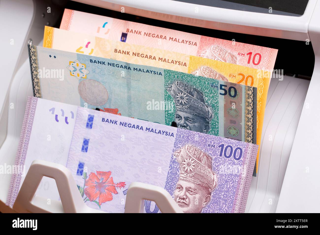 Malaysian money - ringgit in the counting machine Stock Photo - Alamy