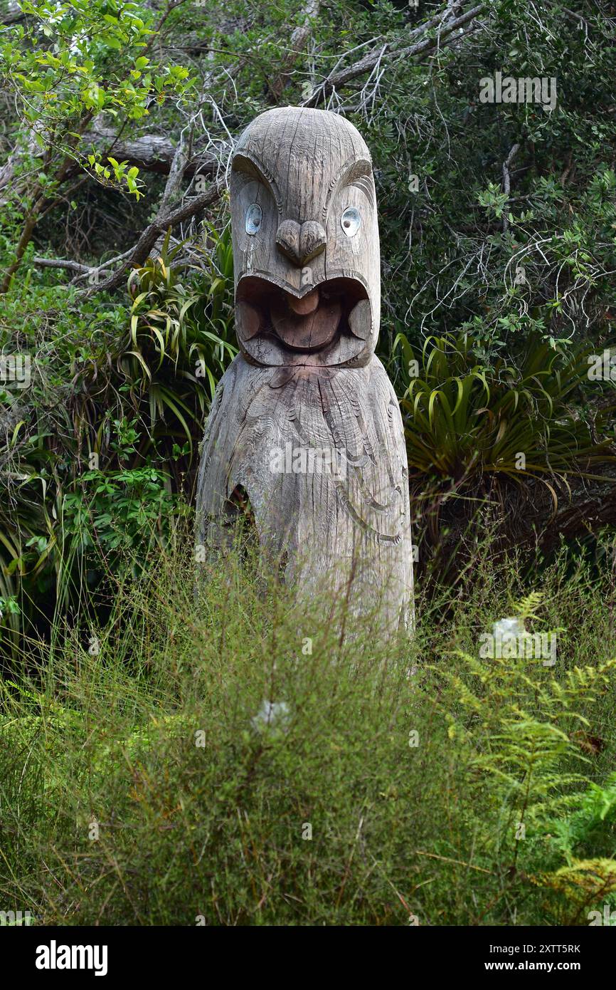 Weathered Polynesian carved wooden statue with abalone shell eyes in ...