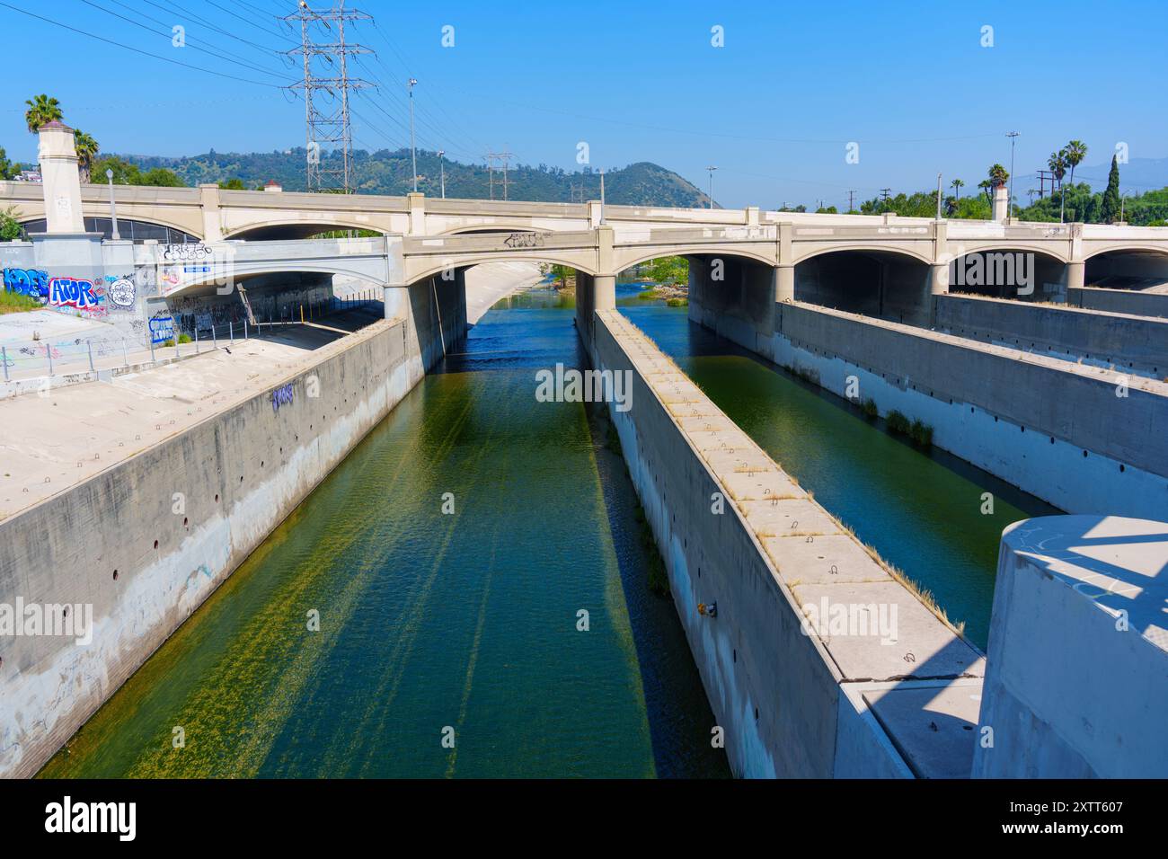 Los Angeles, California - April 21, 2024: View of the Los Angeles River featuring concrete ...