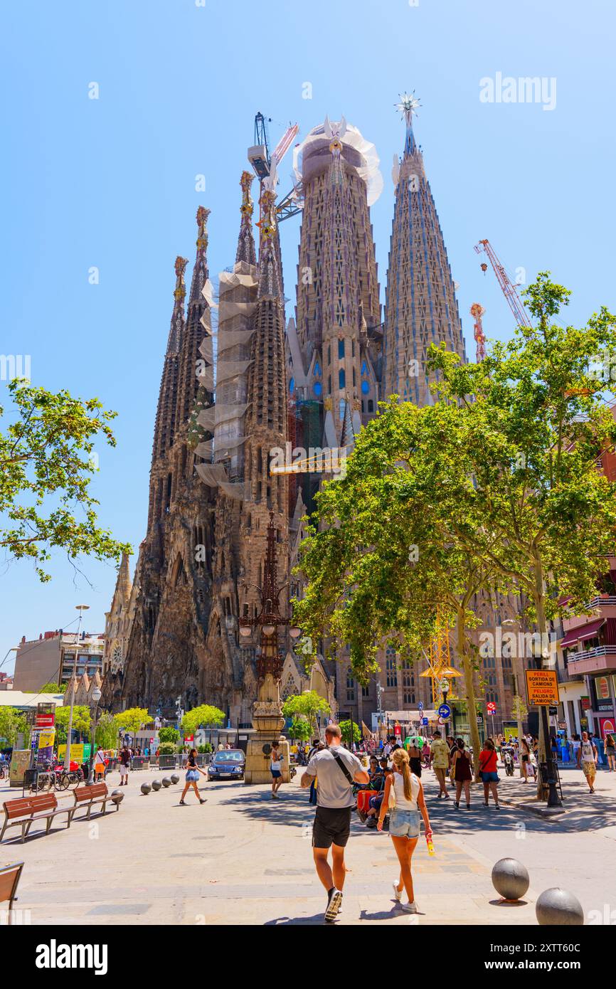 Barcelona, Spain - July 11, 2024: Sagrada Familia towers prominently ...