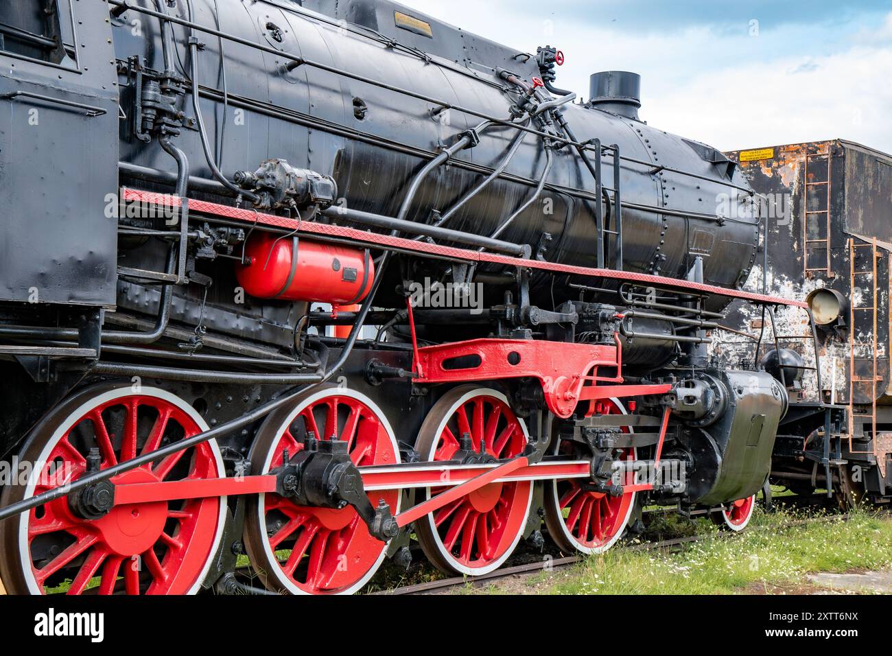 Rusty old steam train showcasing intricate details at a historic ...